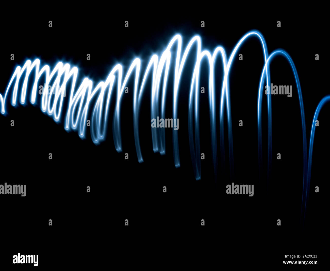 An abstract light scribble over black background Stock Photo - Alamy