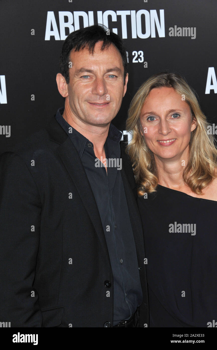 LOS ANGELES, CA. September 15, 2011: Jason Isaacs & wife at the world ...