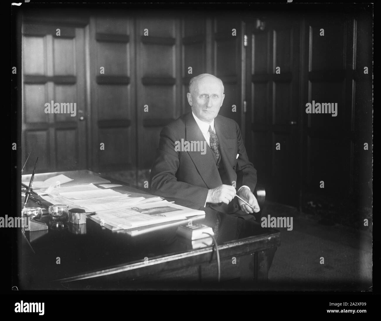 Robert P. Lamont at desk Stock Photo - Alamy