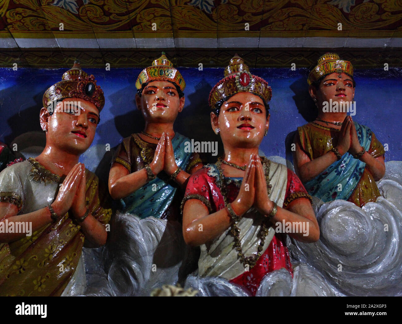 Hindu God Statue with carvings on it Stock Photo - Alamy