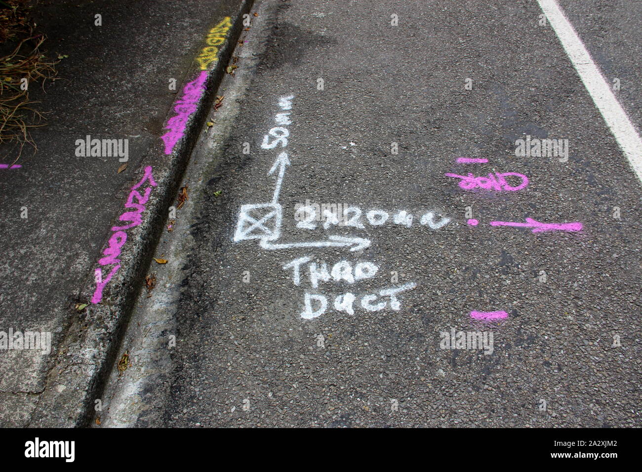Street maintenance road markings Stock Photo - Alamy