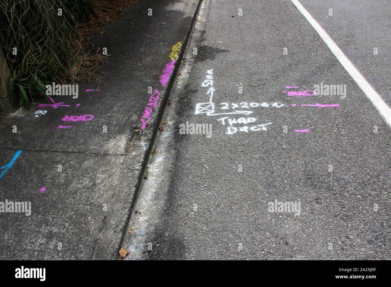 Street maintenance road markings Stock Photo - Alamy