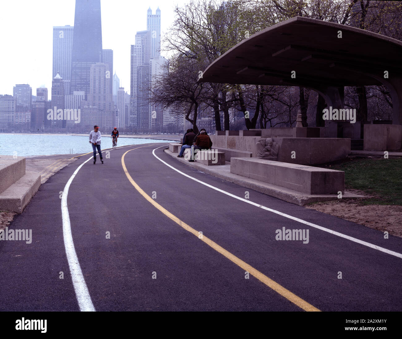 Roller skater passes the Chess Pavilion in Lincoln Park along Lake ...