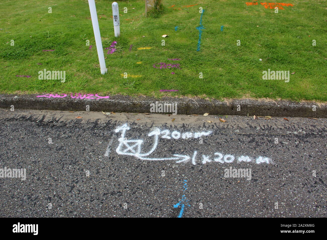 Street maintenance road markings Stock Photo - Alamy