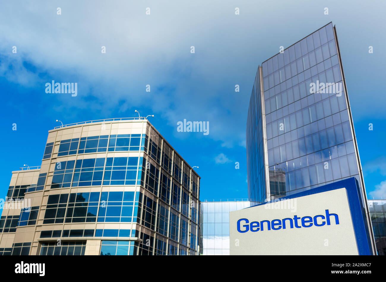 Genentech company sign at biotechnology corporation headquarters campus ...