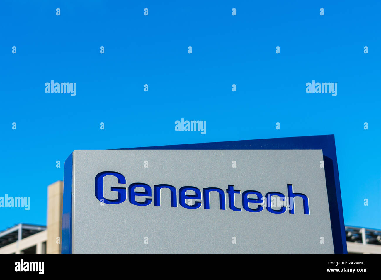 Genentech company sign at biotechnology corporation headquarters campus ...