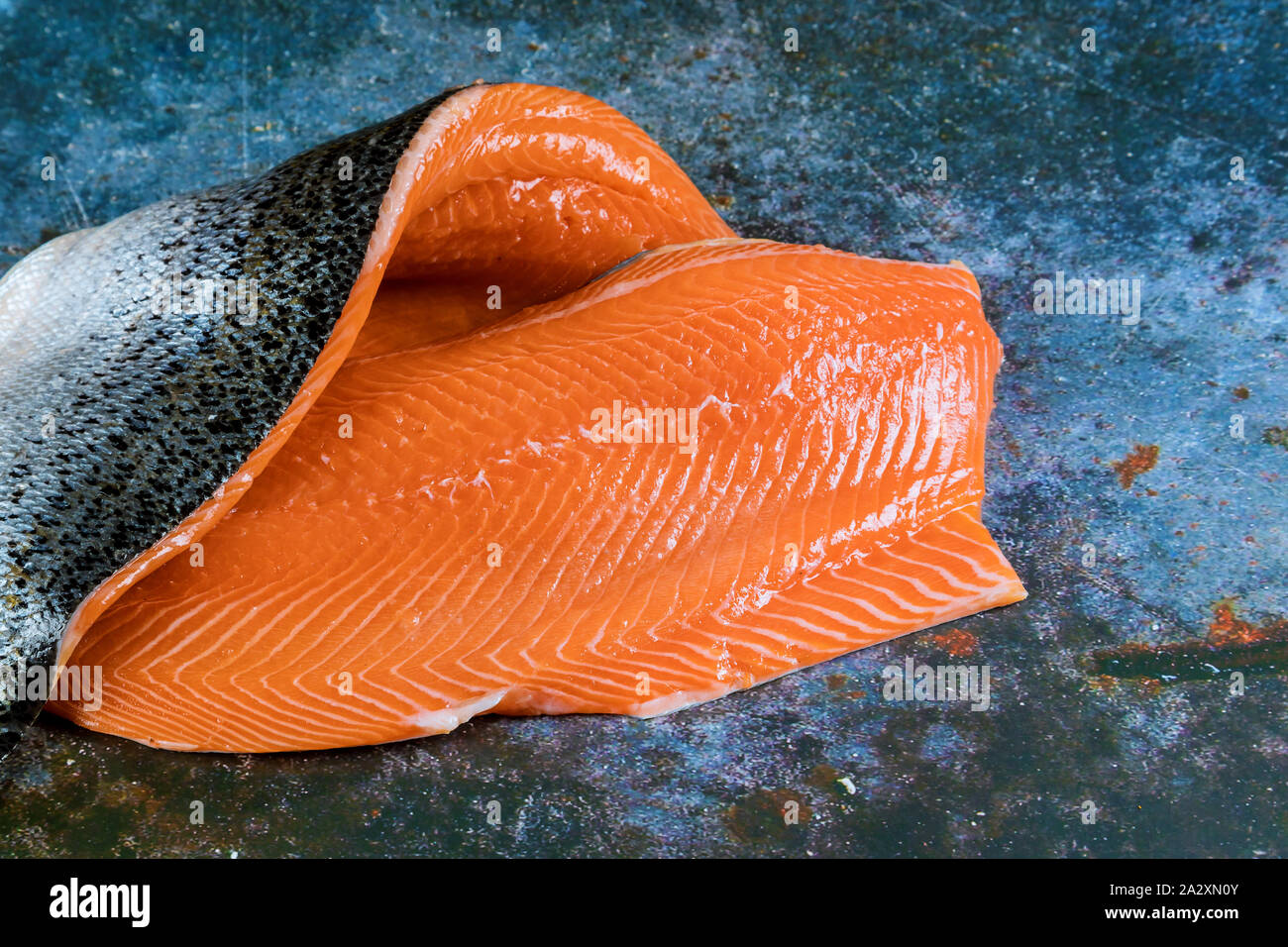 Fresh salmon with fillet on board, top view with space for your text ...