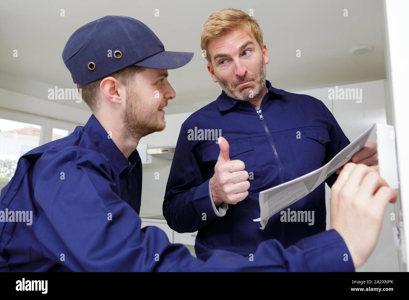 happy mentor with apprentice Stock Photo - Alamy
