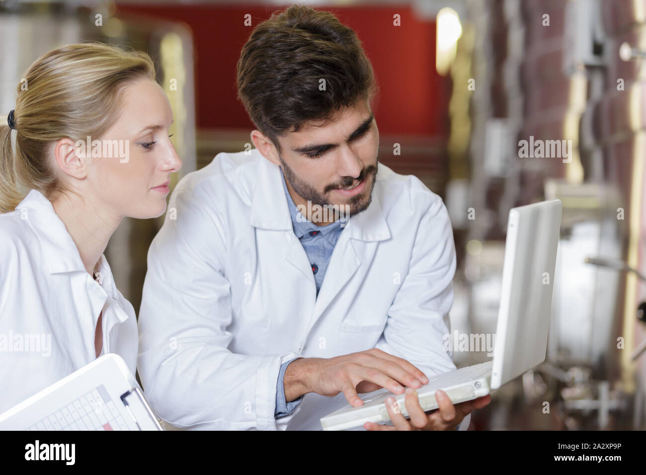 food factory worker using laptop Stock Photo - Alamy