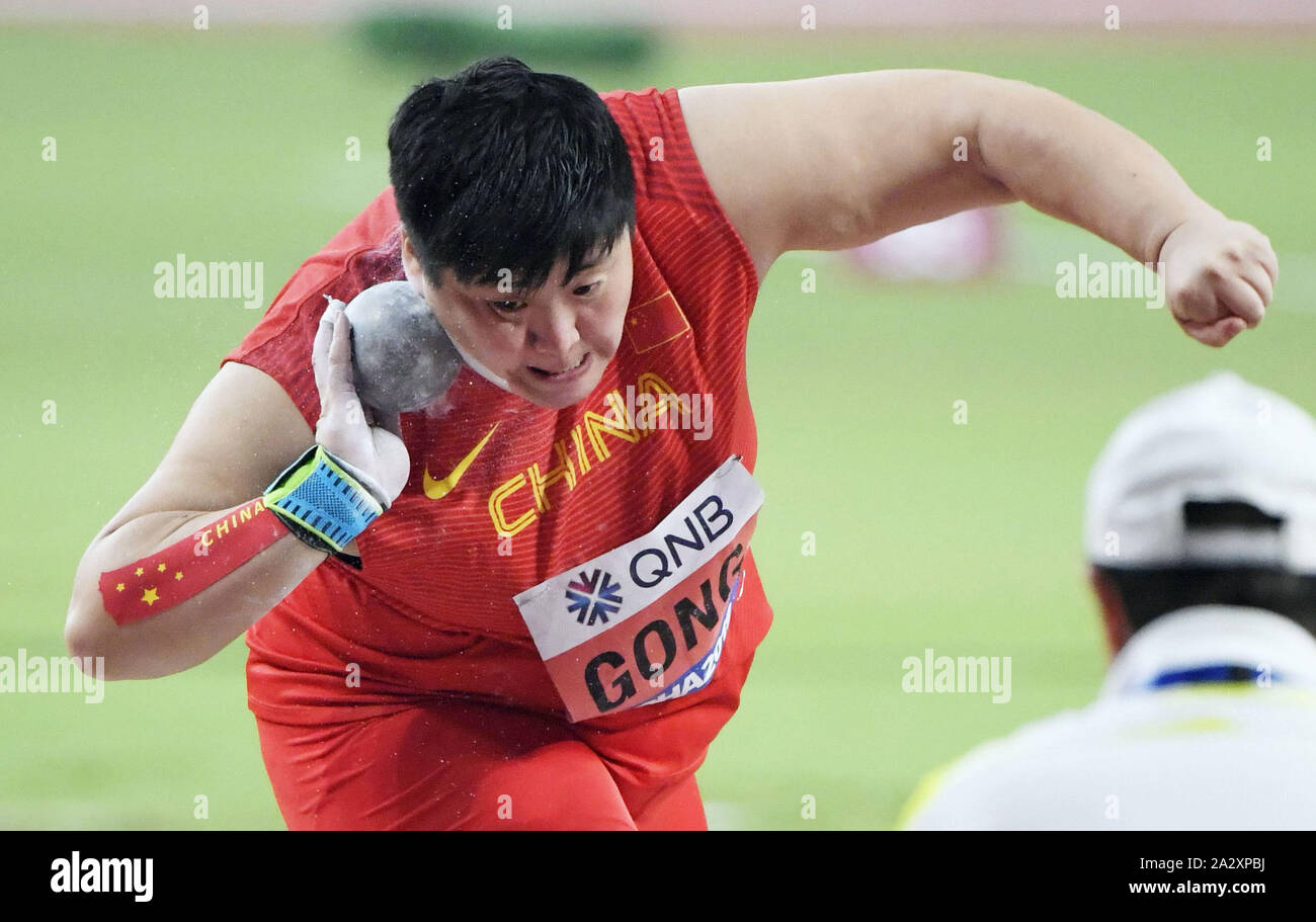 Reigning champion Gong Lijiao of China competes in the women's shot put ...
