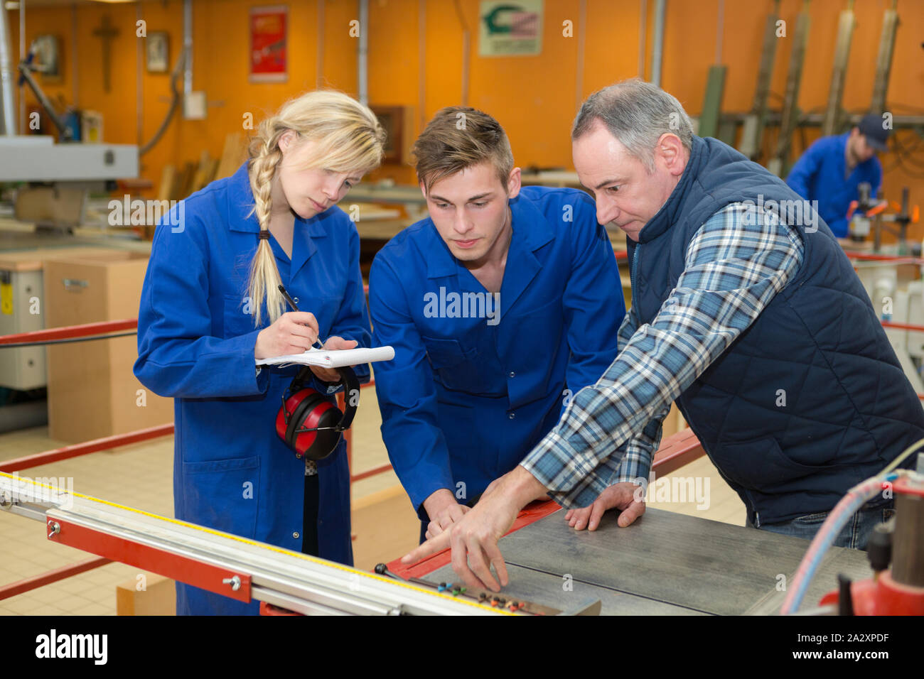 Carpenter explains hi-res stock photography and images - Alamy