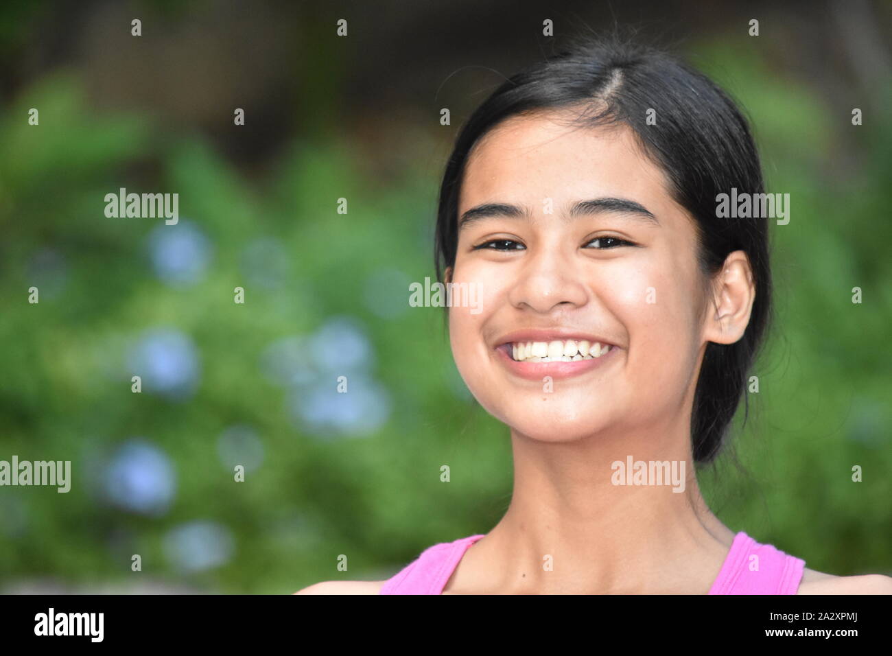 A Cute Minority Female Smiling Stock Photo - Alamy