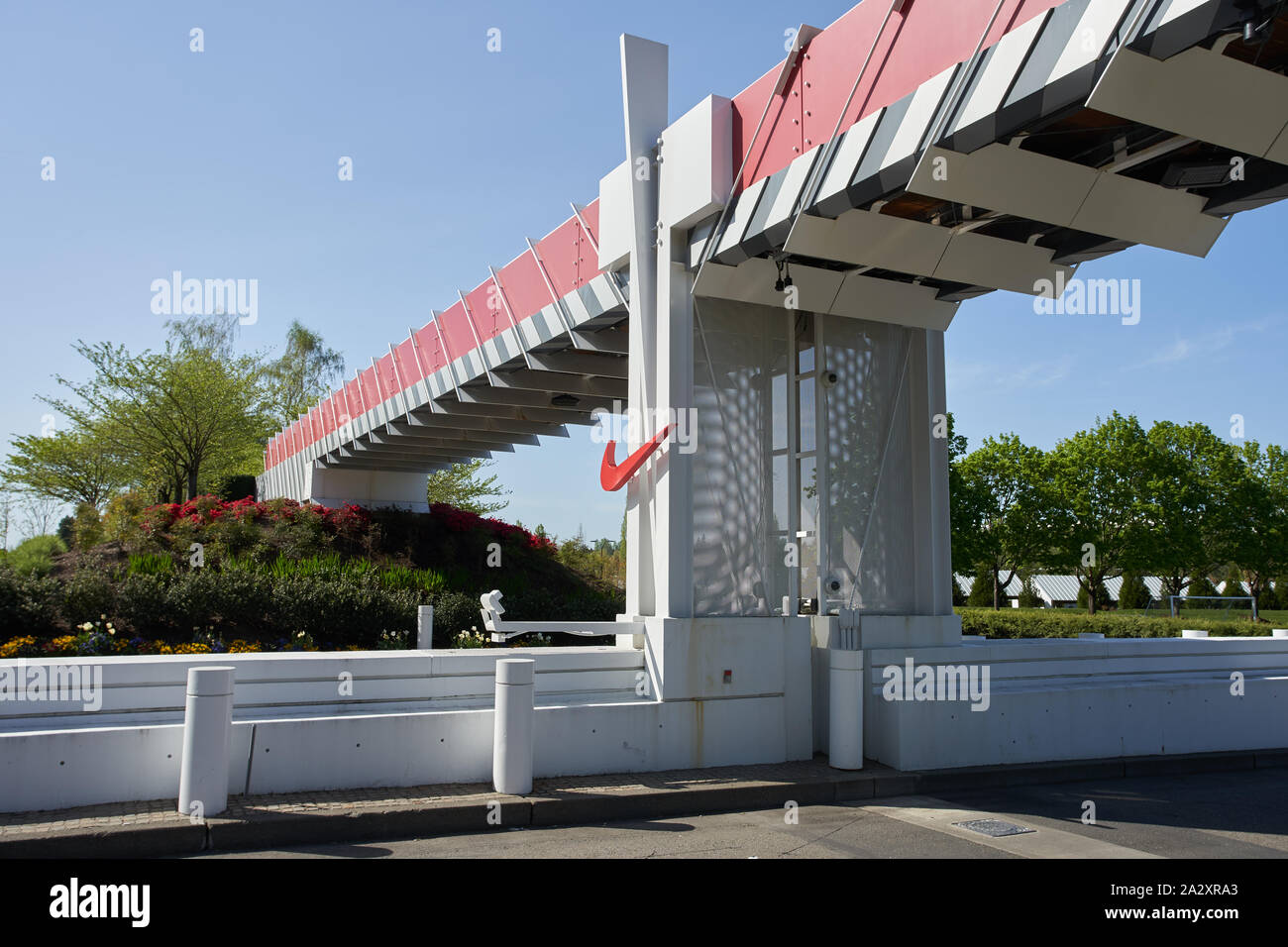 The Nike "Swoosh" logo is seen at one of the entrances to Nike World ...