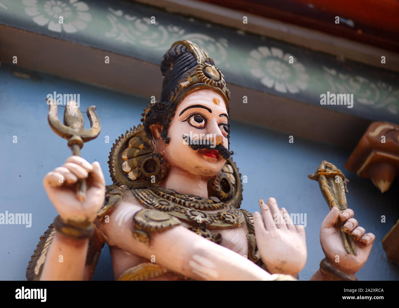 Hindu God Statue with carvings on it Stock Photo - Alamy