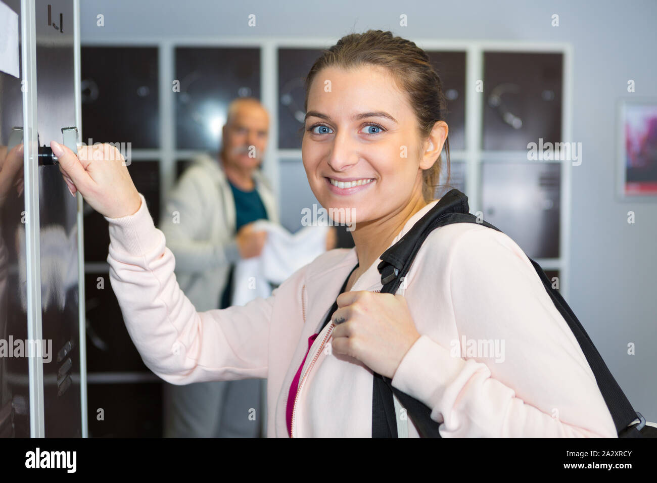 young woman is getting ready for fitness training Stock Photo - Alamy