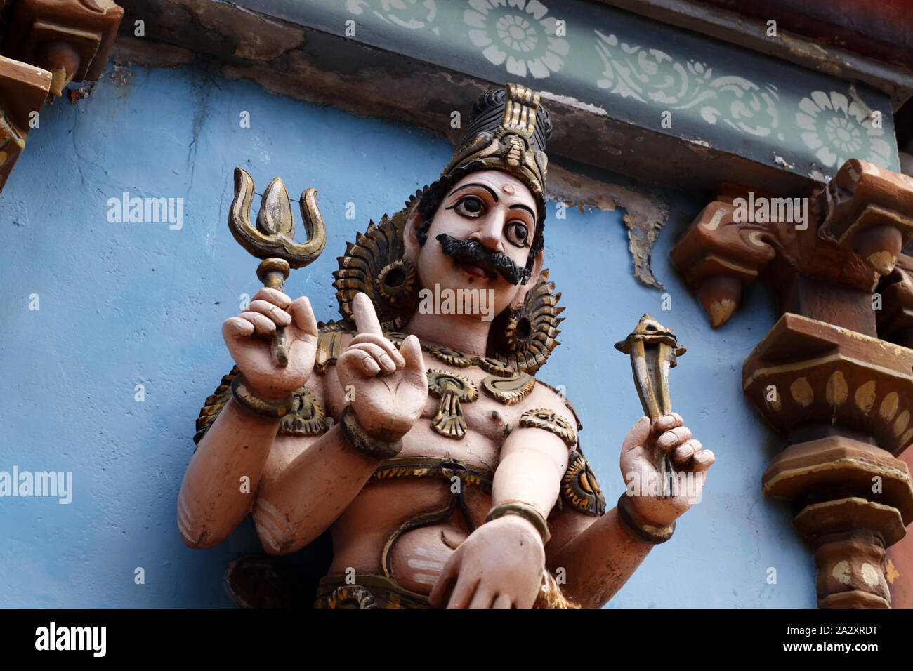 Hindu God Statue with carvings on it Stock Photo - Alamy