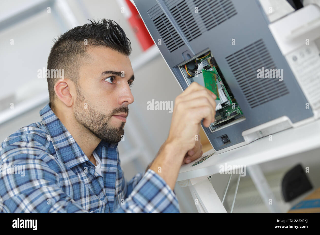 device programmer inserting the chip Stock Photo - Alamy