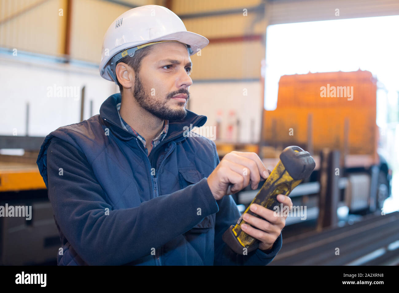 building crane operator with remote control in his hands Stock Photo ...