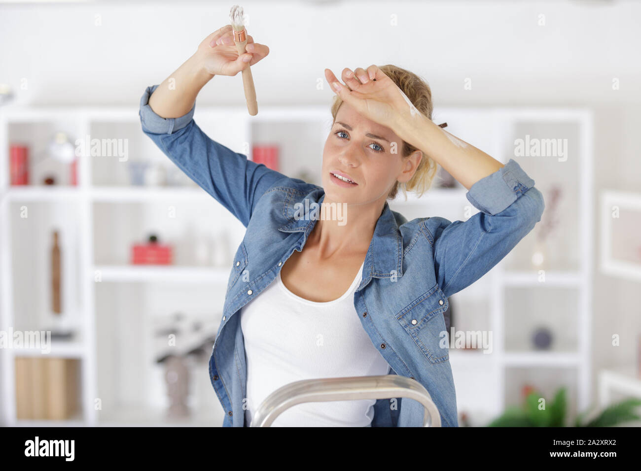 tired woman in casual clothes Stock Photo - Alamy