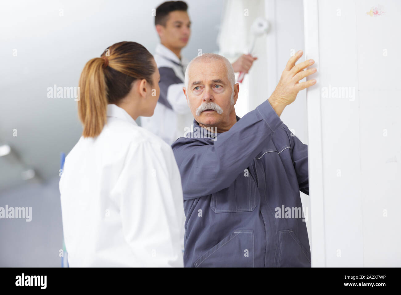 portrait of instrustor and apprentice Stock Photo - Alamy