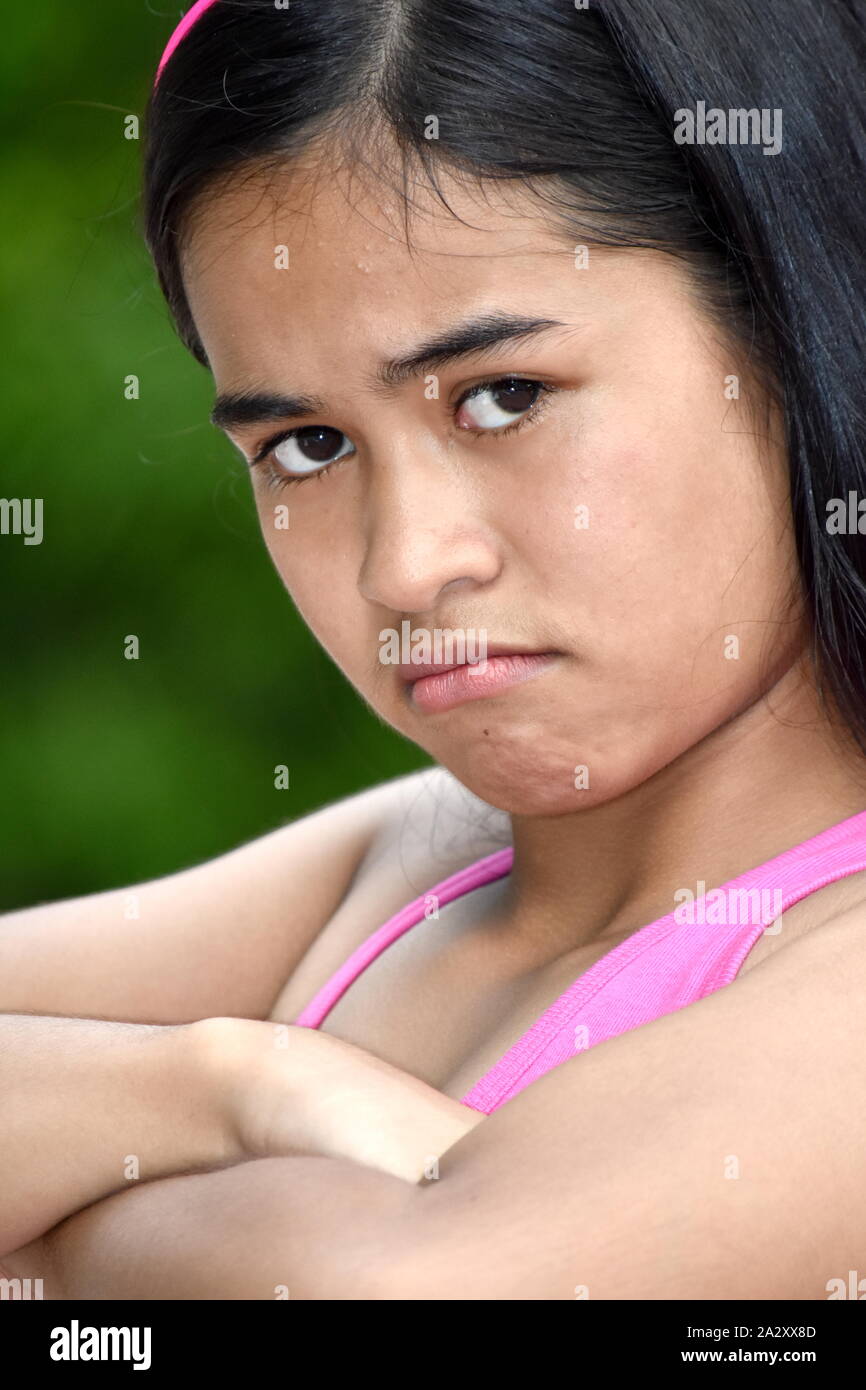 An A Stubborn Diverse Teenager Girl Stock Photo - Alamy