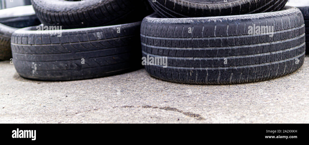 Stack pile of used car tires for recycling Stock Photo - Alamy
