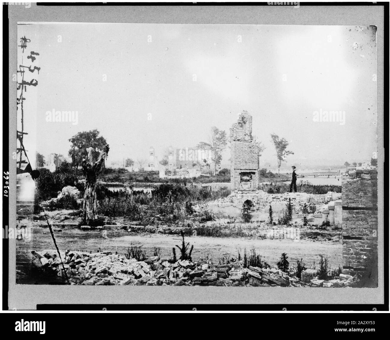 Ruins at Hampton, Virginia showing chimneys, and man standing Stock ...