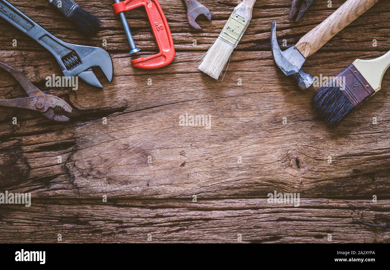 Set of rusty hand tools renovation on grunge wood. copyspace image ...