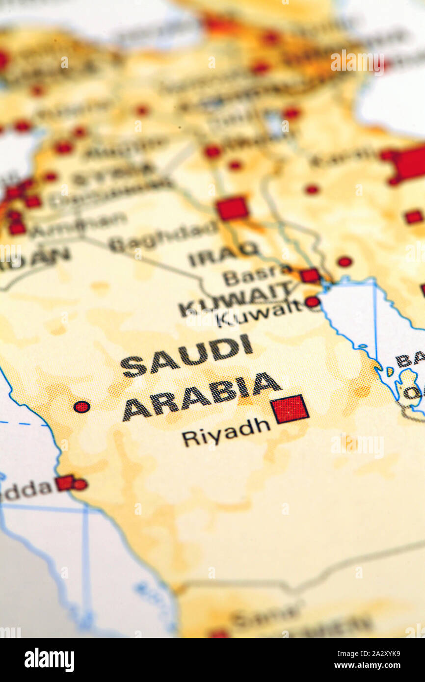 Saudi Arabia on atlas world map Stock Photo - Alamy