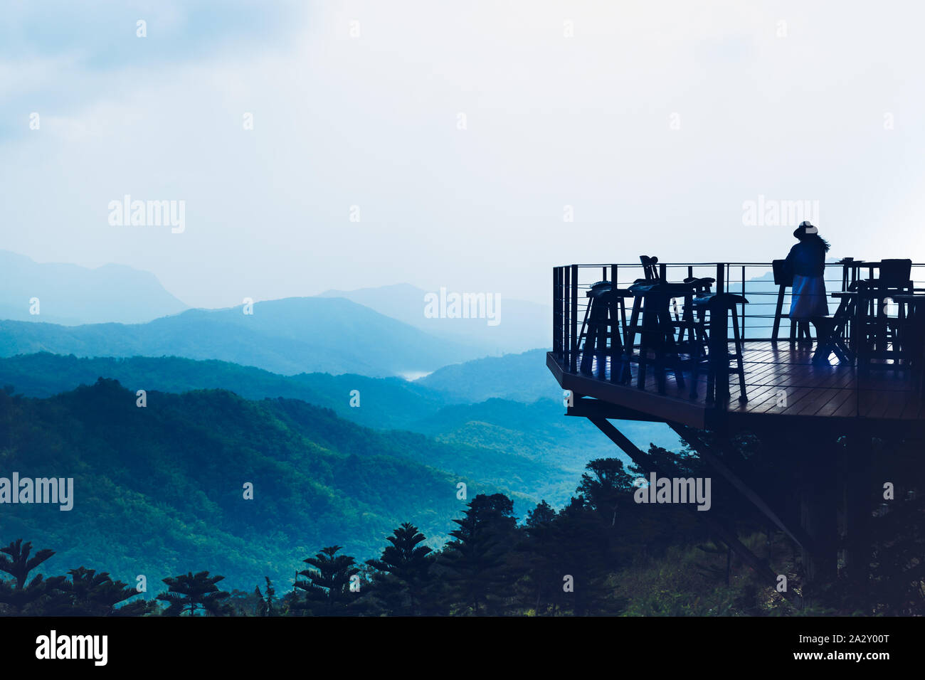 Girl standing drinking coffee hi-res stock photography and images - Alamy