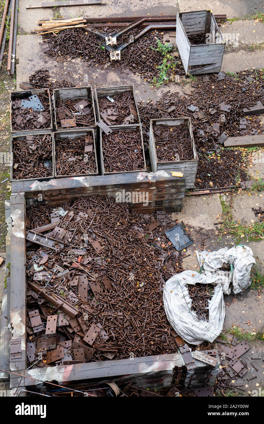 Spare parts for railway track repair. Scrap, screws, rails and wooden ...