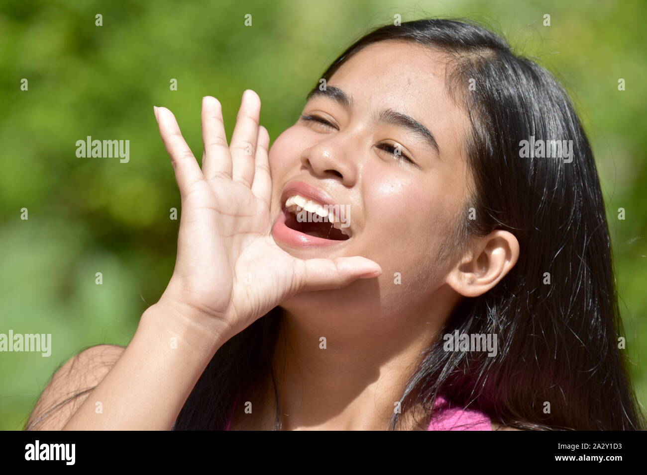 An A Beautiful Filipina Youth Singing Stock Photo - Alamy