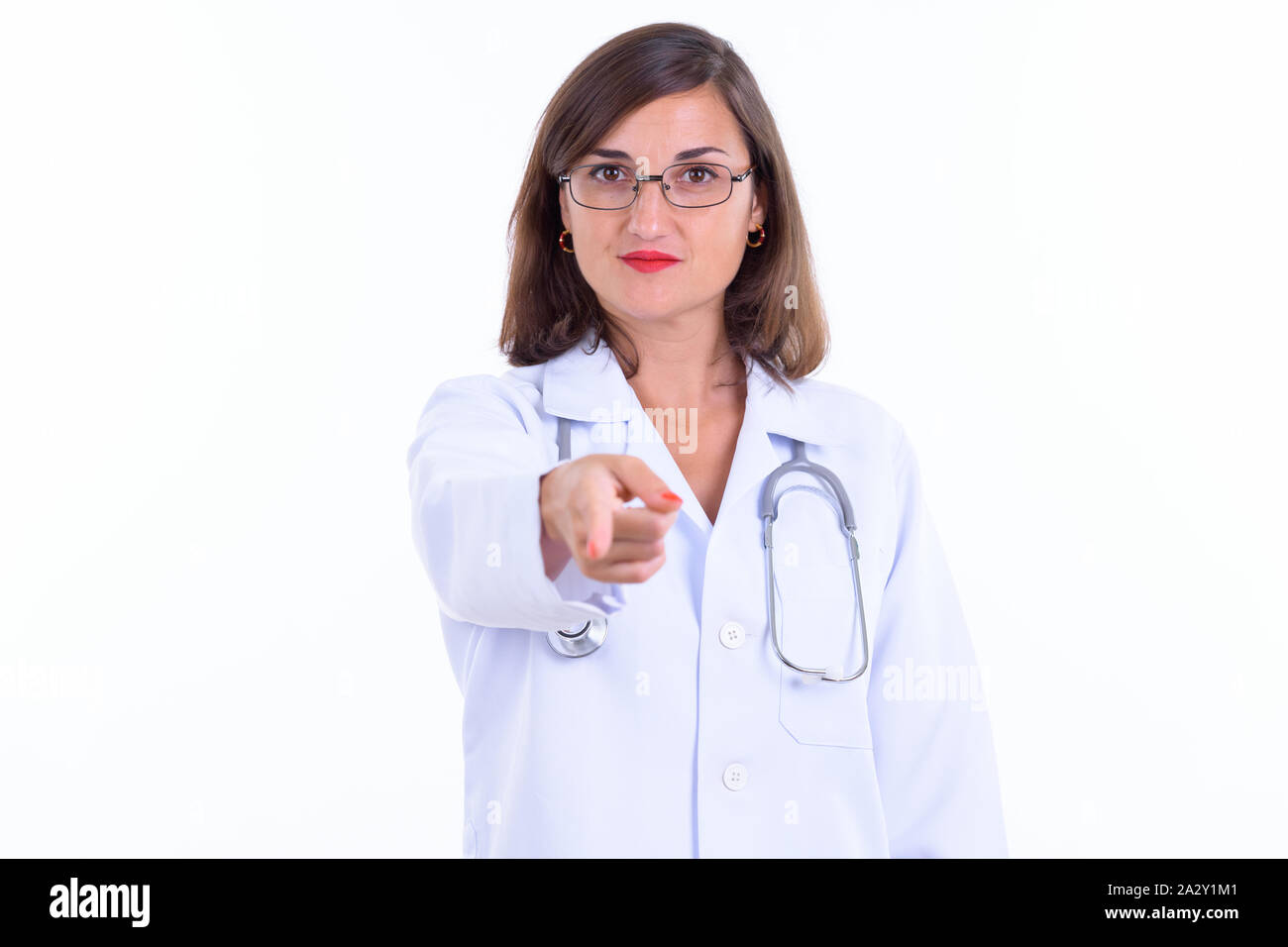 Beautiful woman doctor with eyeglasses pointing at camera Stock Photo ...