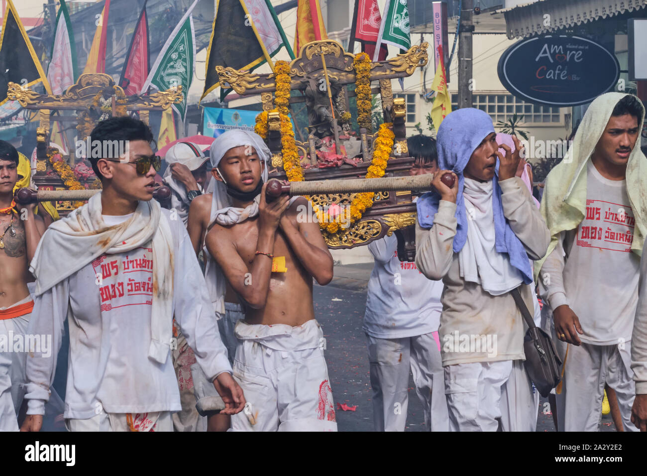 Palanquin bearers in a procession during the Vegetarian Festival (Nine ...