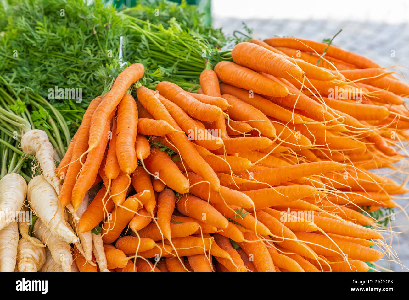 Fresh carrots on a market Stock Photo - Alamy