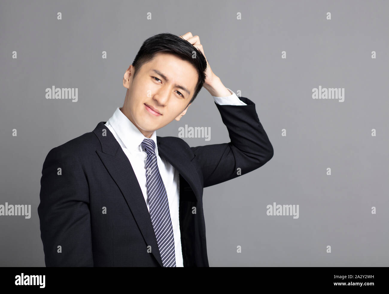 Office worker scratching head hi-res stock photography and images - Alamy