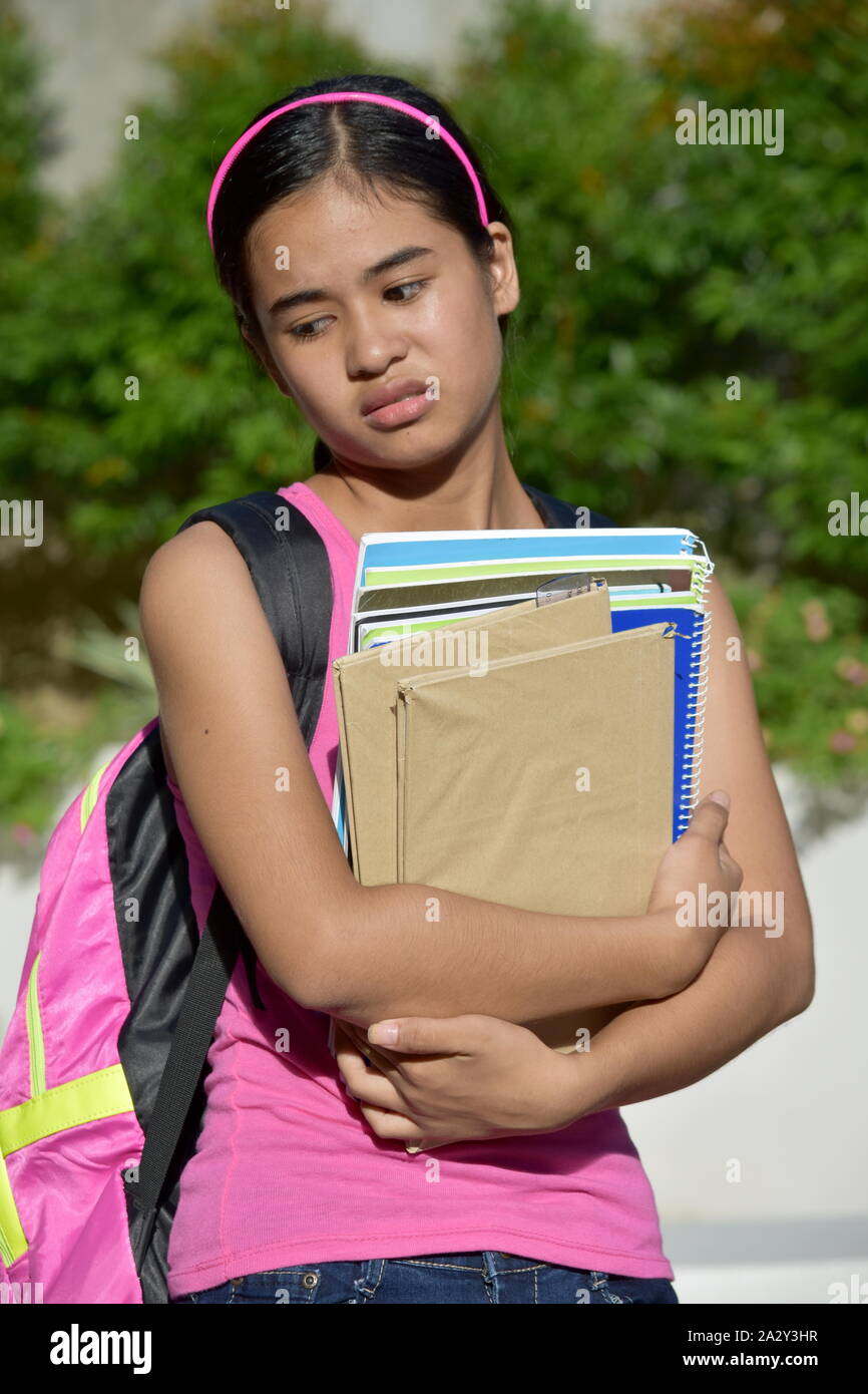Female Student And Confusion With Textbooks Stock Photo - Alamy