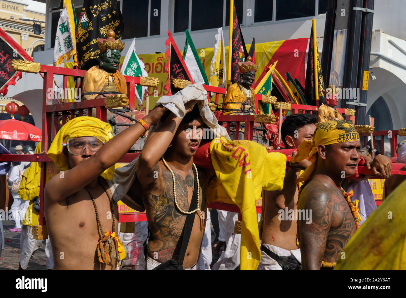 Palanquin bearers in procession during the Vegetarian Festival (Nine ...