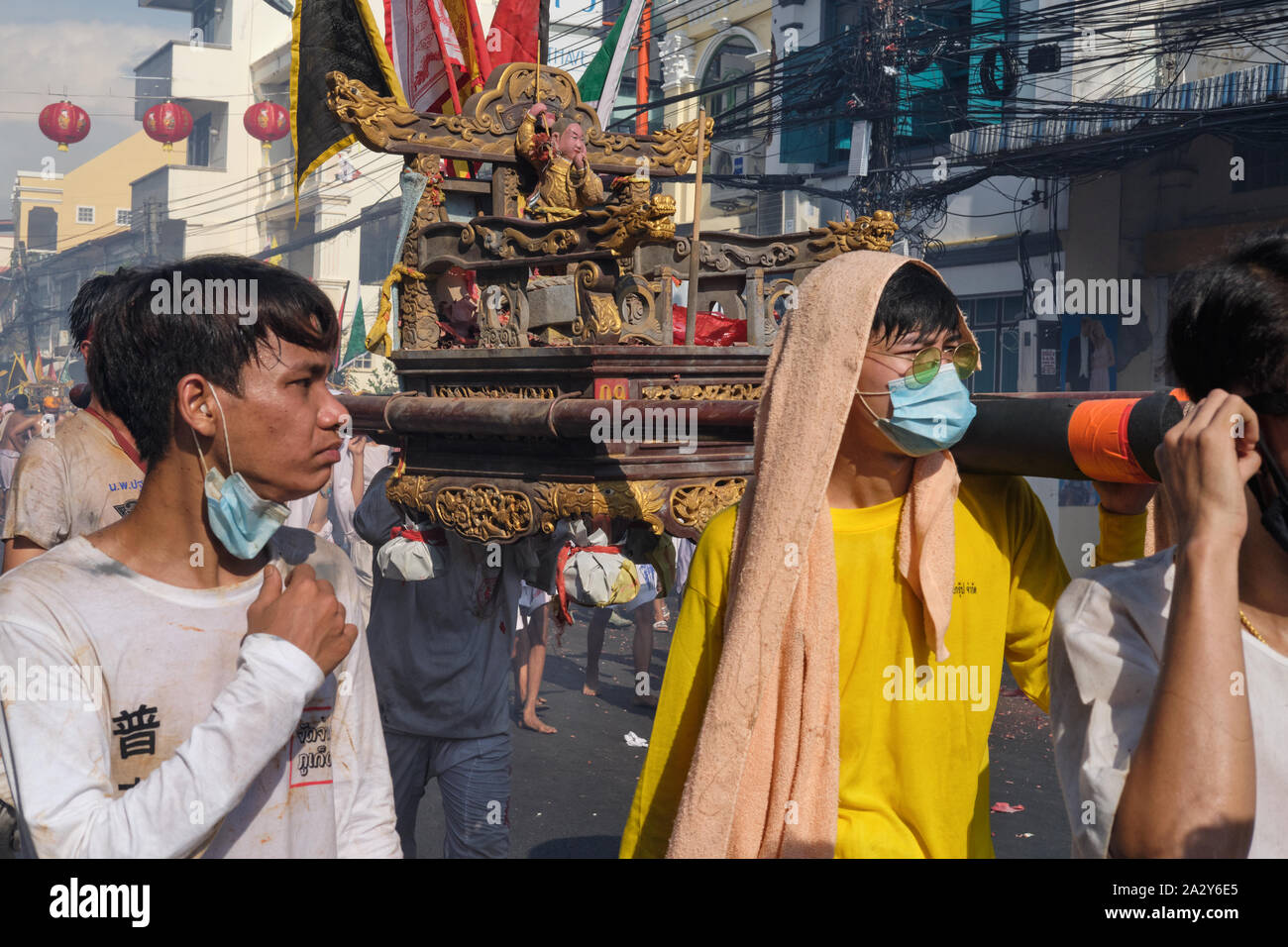 Palanquin bearers in procession during the Vegetarian Festival (Nine ...