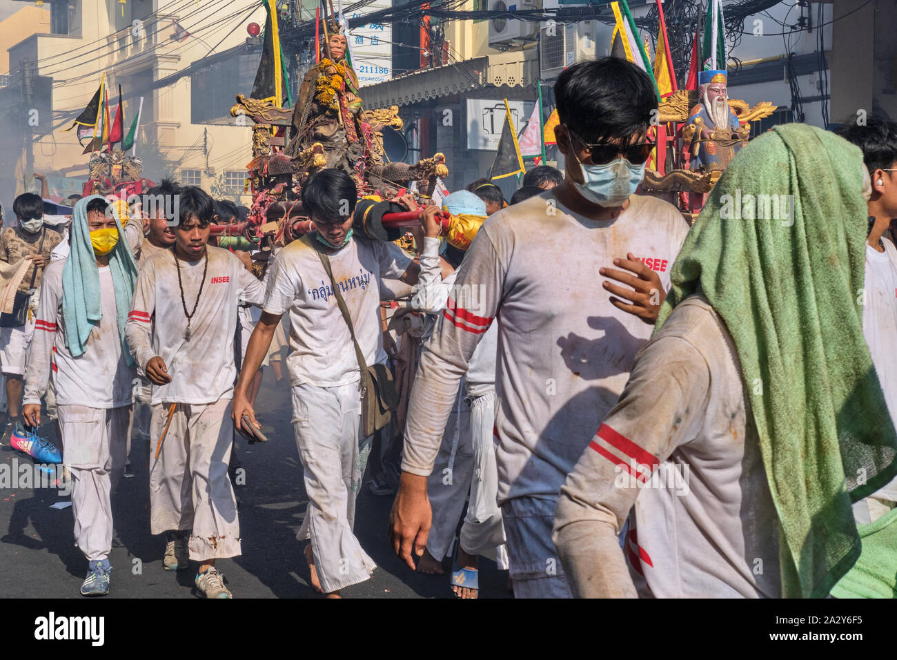 Palanquin bearers in procession during the Vegetarian Festival (Nine ...