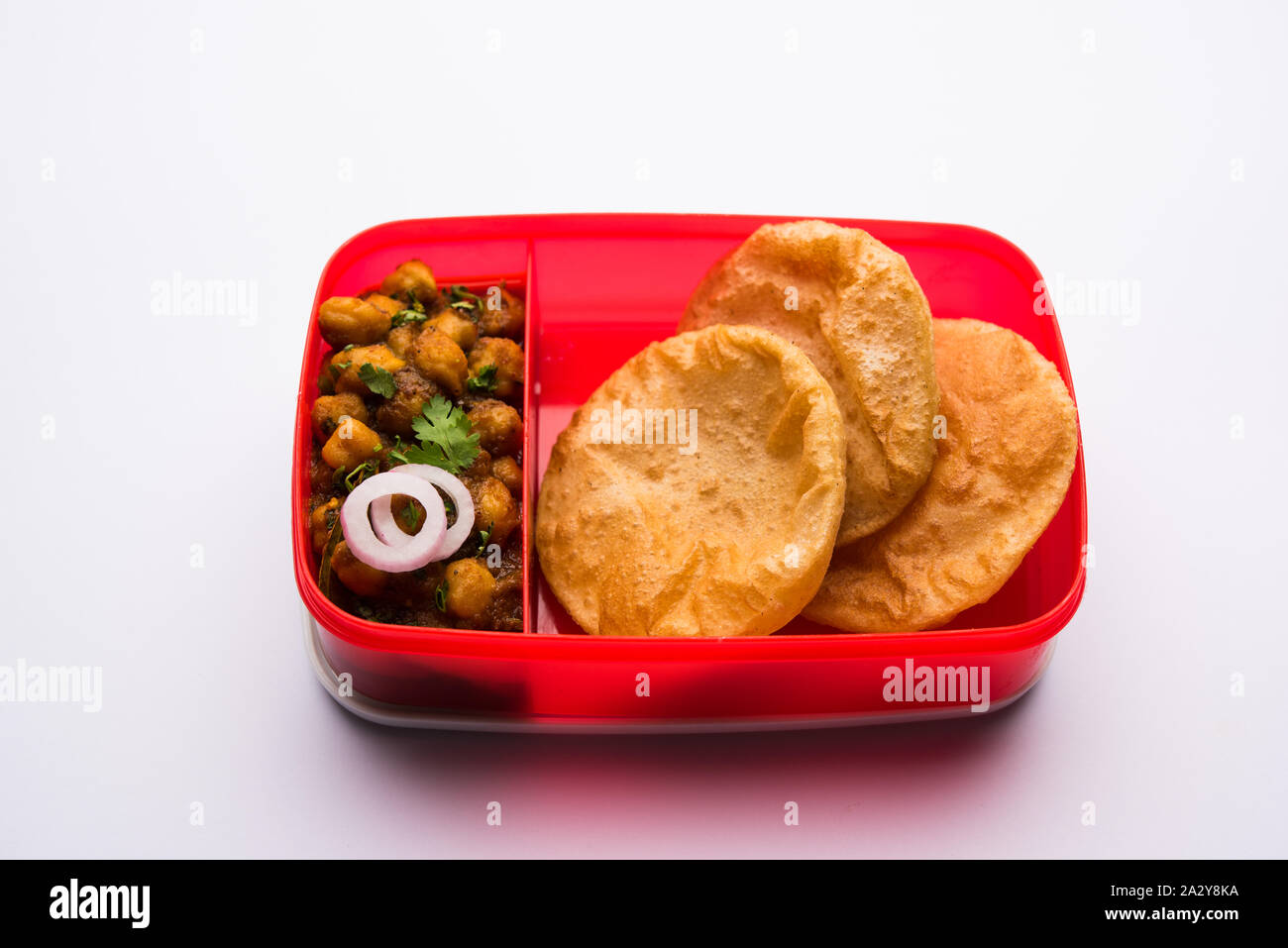 Punjabi Chole / Choley masala with puri or poori in lunch box or tiffin ...