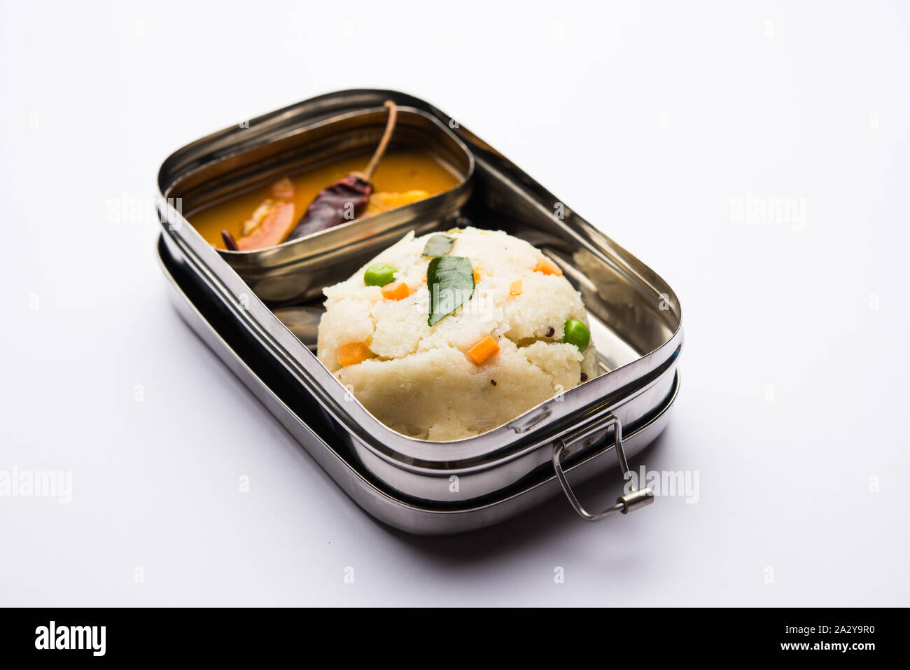 Upma / uppuma sambar in lunch box or tiffin Stock Photo - Alamy