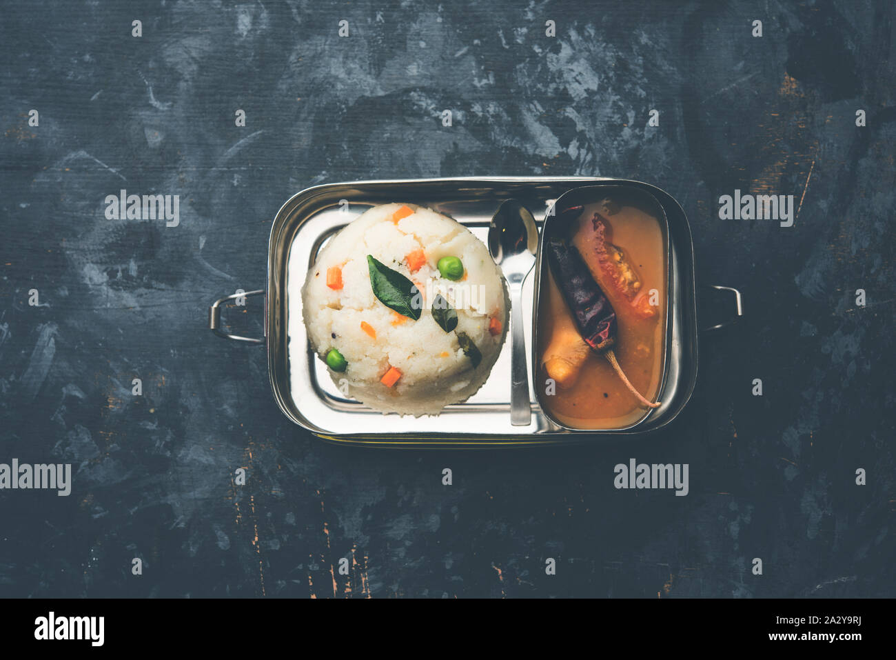 Upma / uppuma sambar in lunch box or tiffin Stock Photo - Alamy