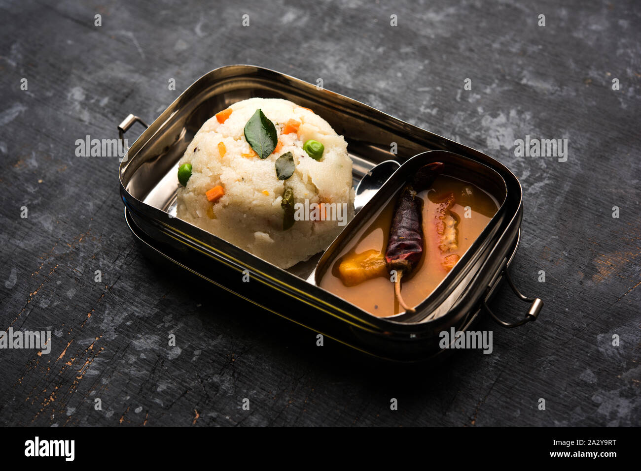 Upma / uppuma sambar in lunch box or tiffin Stock Photo - Alamy