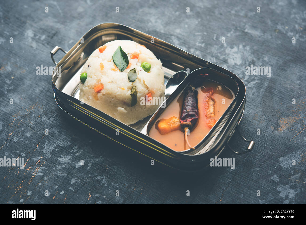 Upma / uppuma sambar in lunch box or tiffin Stock Photo - Alamy