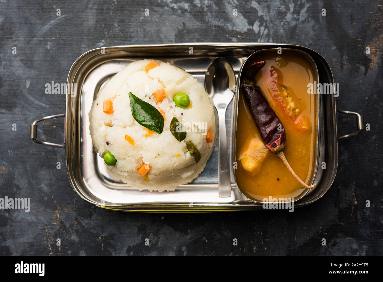 Upma / uppuma sambar in lunch box or tiffin Stock Photo - Alamy