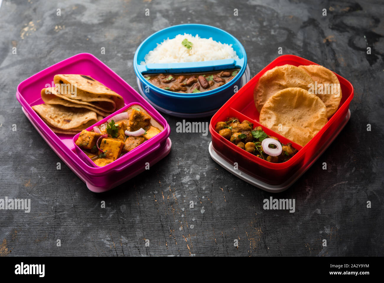 Group of North Indian Food in Tiffin , Lunch Box includes Rajma or ...