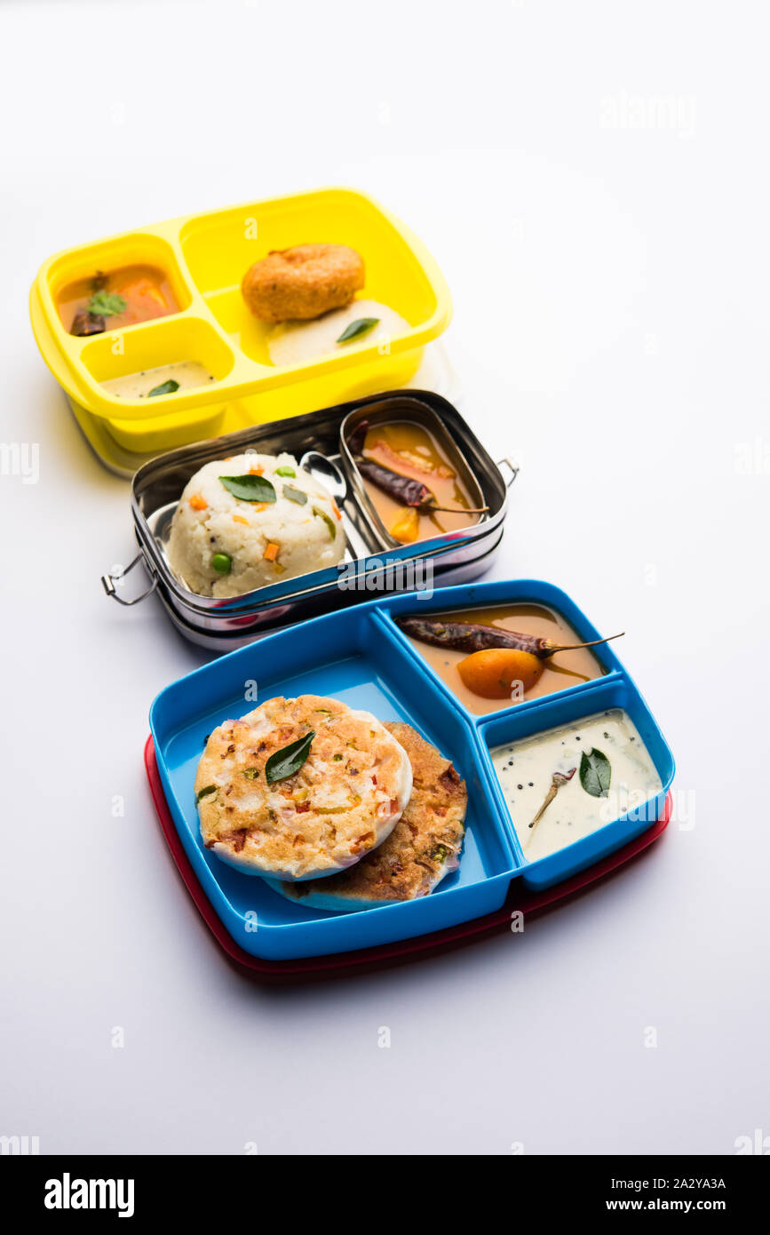 Assorted South Indian tiffin / lunch box food in group, includes idli ...