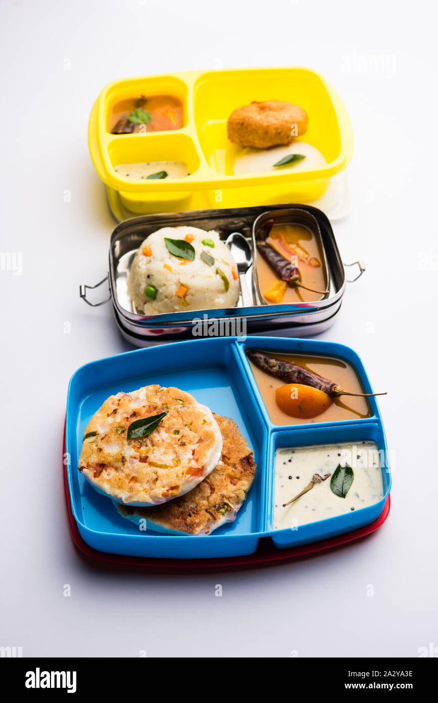 Assorted South Indian tiffin / lunch box food in group, includes idli ...