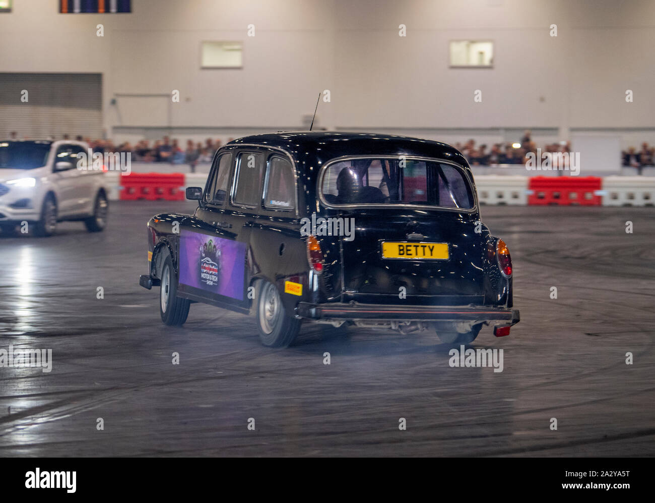 Paul Swift stunt driver, MC'd by Tiff Needell at London Motor Show May ...